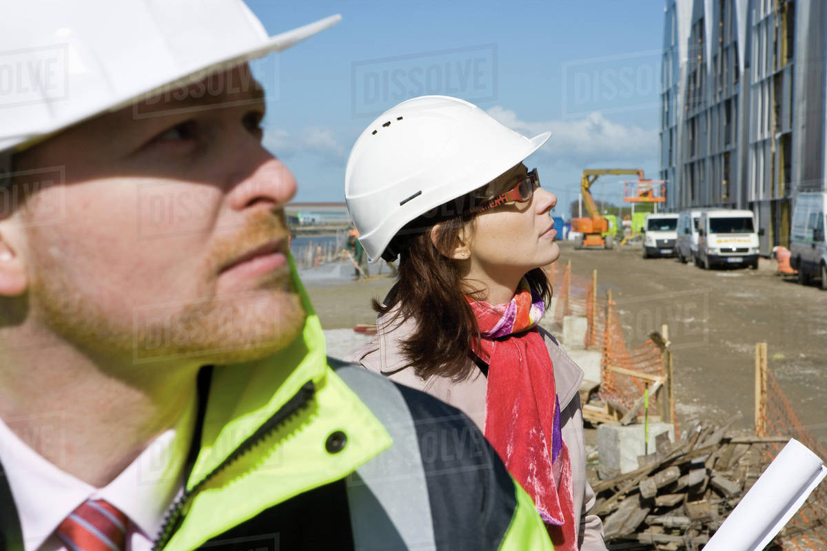 Contractors at construction site - Royalty-free Stock Photo | Dissolve