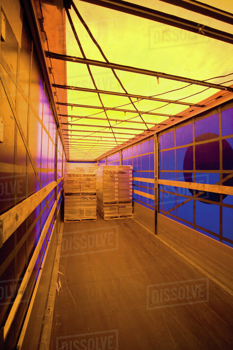 Wrapped pallets of cardboard boxes in trailer for delivery - Stock ...