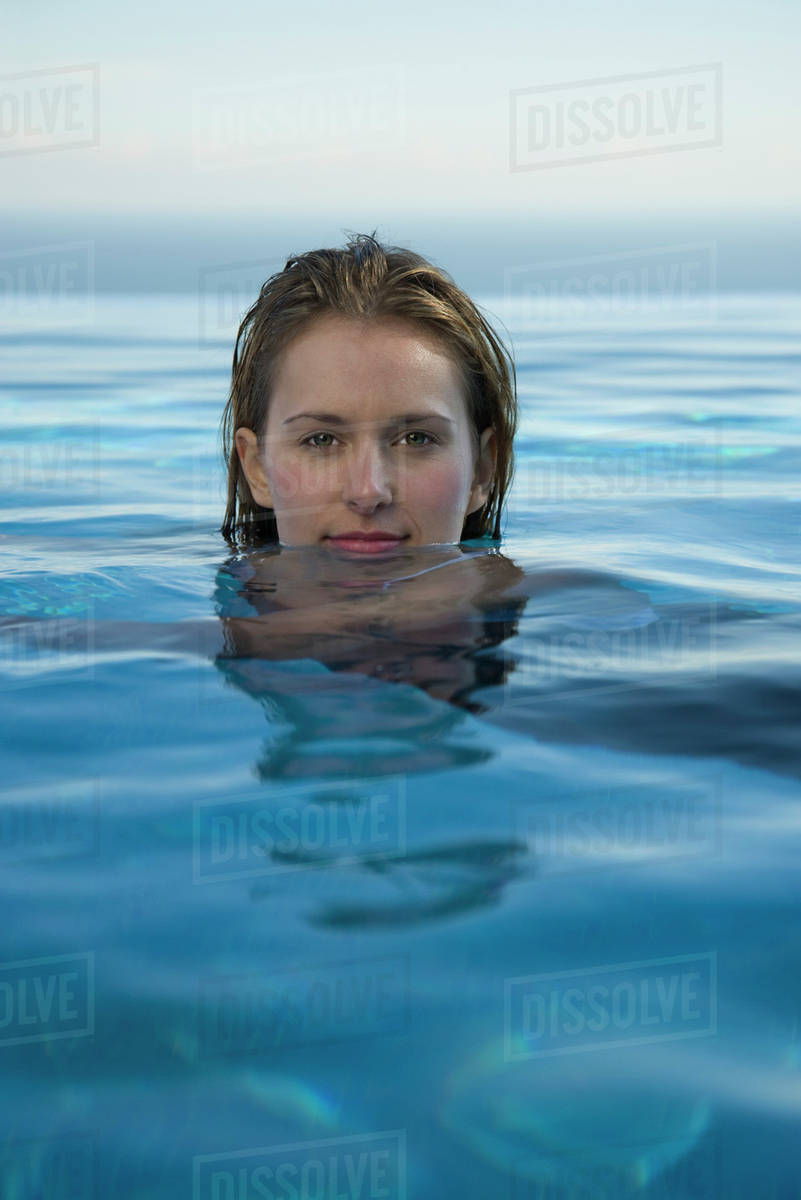 Woman relaxing in water, portrait - Royalty-free Stock Photo | Dissolve