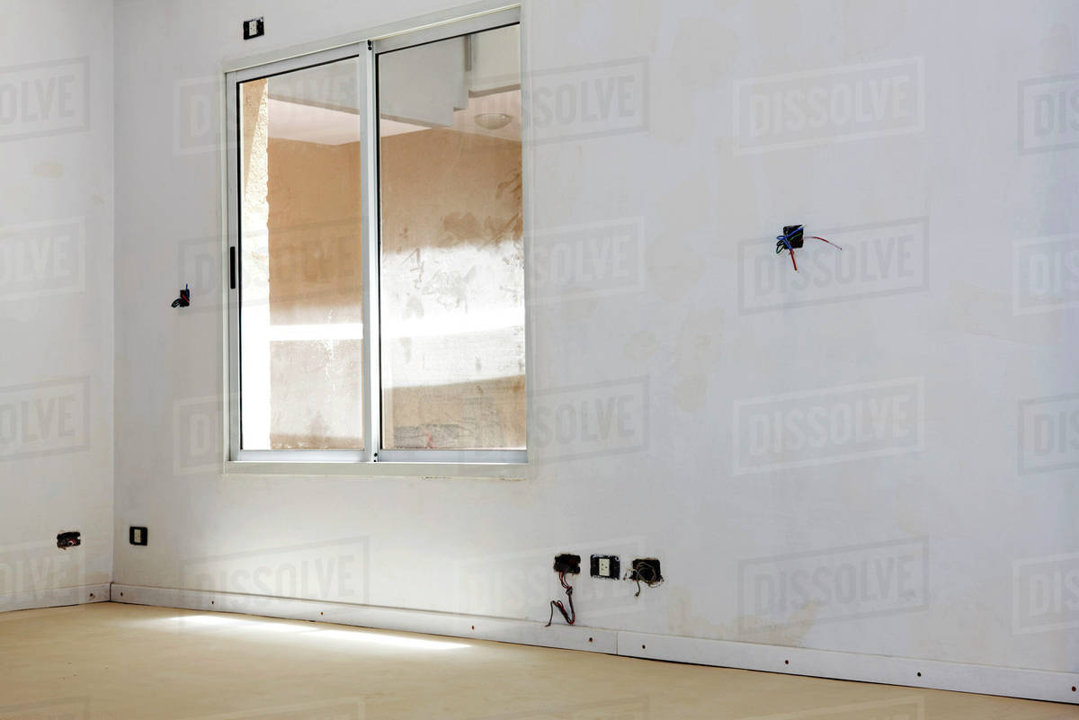 Interior of apartment under renovation, streaked windows, uninstalled ...