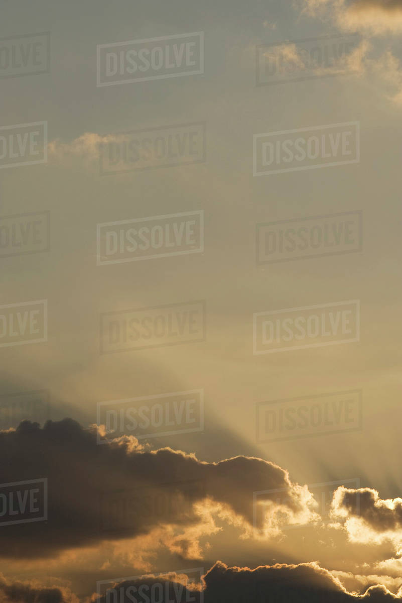 Sky with backlit clouds - Stock Photo - Dissolve