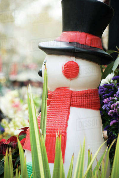 Snowman figurine, side view - Stock Photo - Dissolve