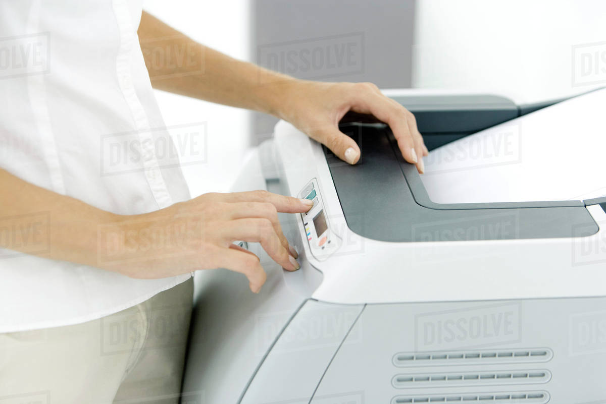 Female using photocopier, cropped view - Royalty-free Stock Photo ...