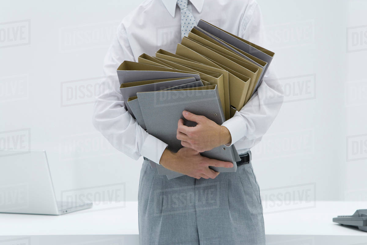 Man holding many binders, cropped view - Royalty-free Stock Photo ...
