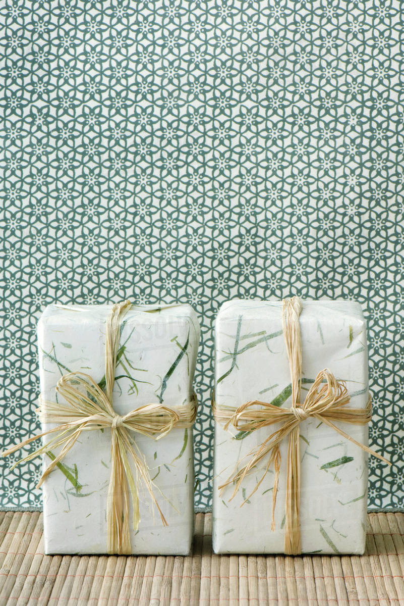 Two gift wrapped presents side by side, standing on end - Royalty-free ...