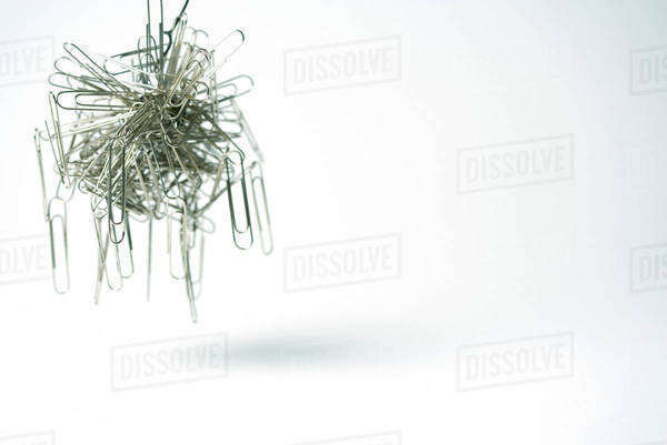 Tangle of magnetized paper clips - Royalty-free Stock Photo | Dissolve