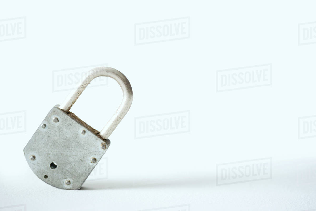 Metal padlock tilted to one side, close-up - Royalty-free Stock Photo ...