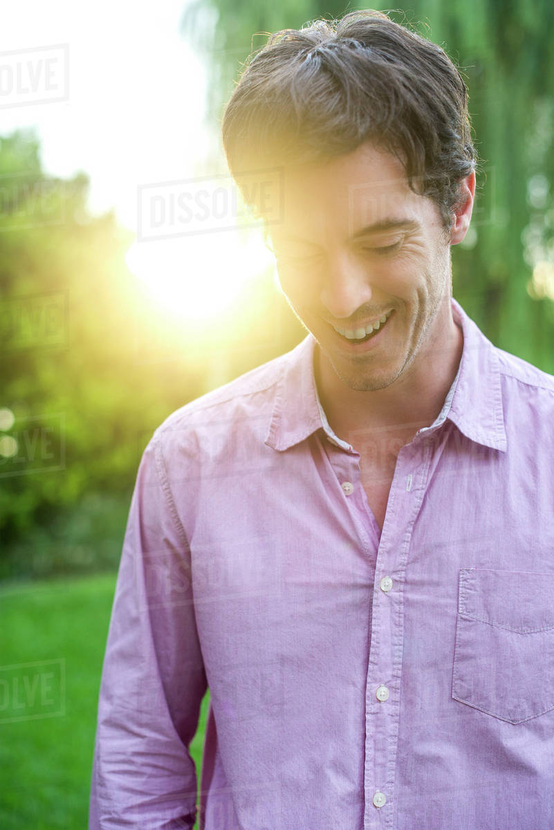 Man walking in park - Royalty-free Stock Photo | Dissolve