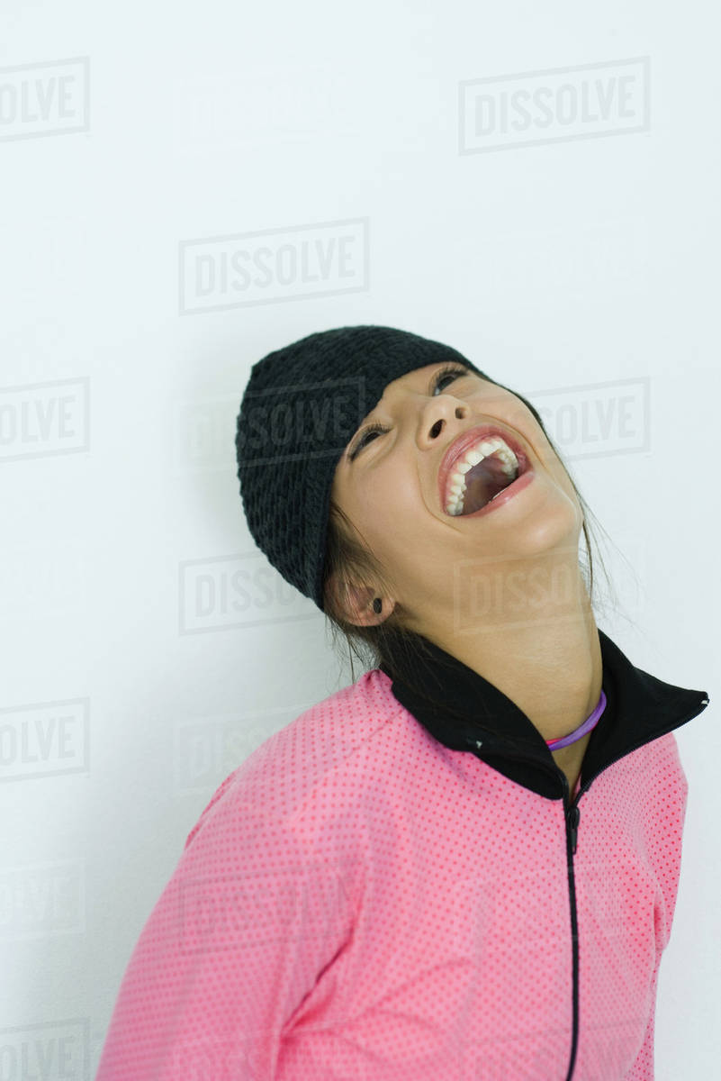 Teenage girl laughing, head back, portrait - Royalty-free Stock Photo ...