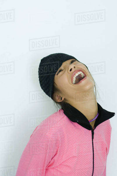 Teenage girl laughing, head back, portrait - Royalty-free Stock Photo ...