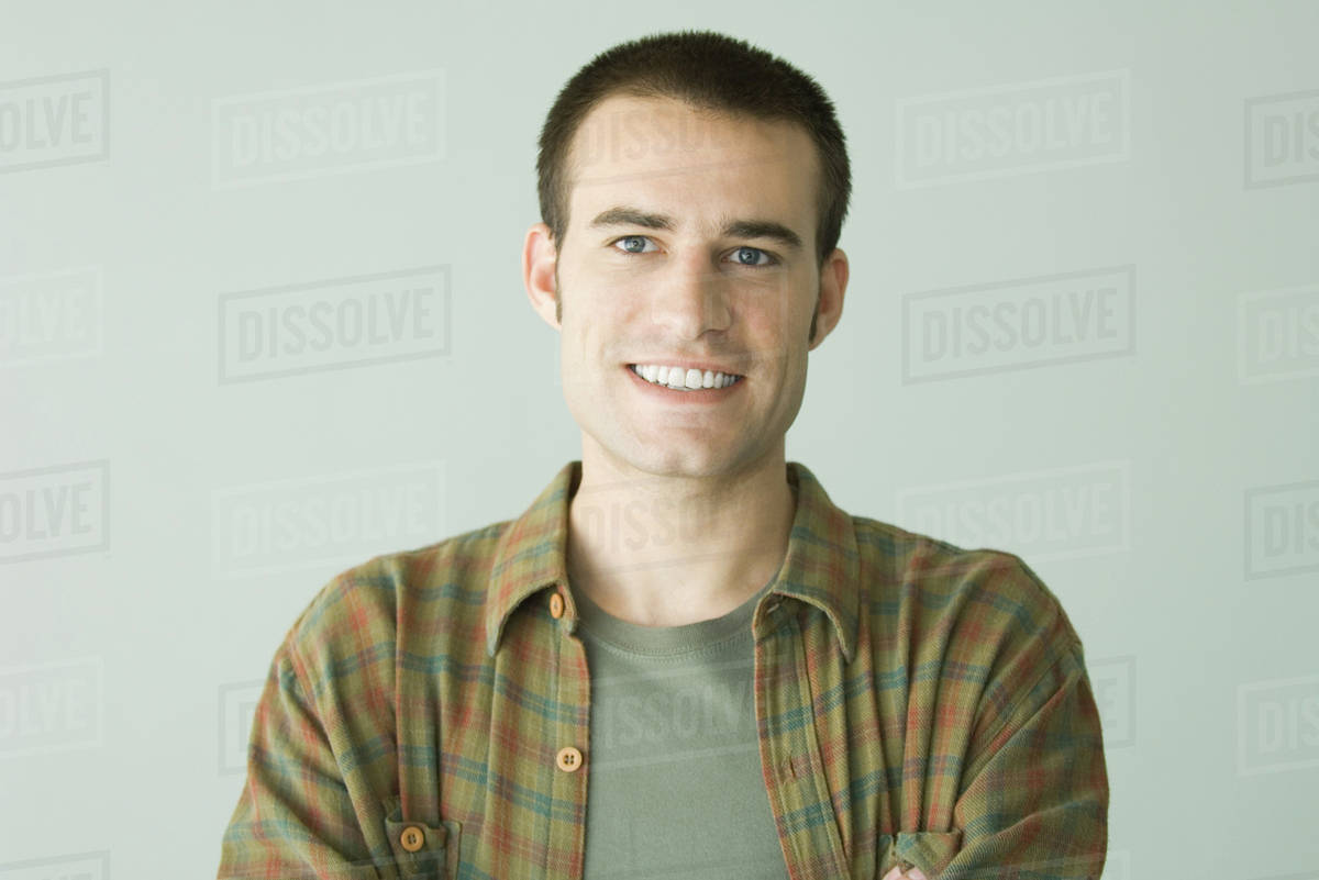 Man smiling at camera, front view, portrait - Royalty-free Stock Photo ...