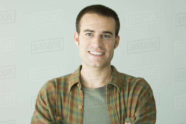 Man smiling at camera, front view, portrait - Royalty-free Stock Photo ...