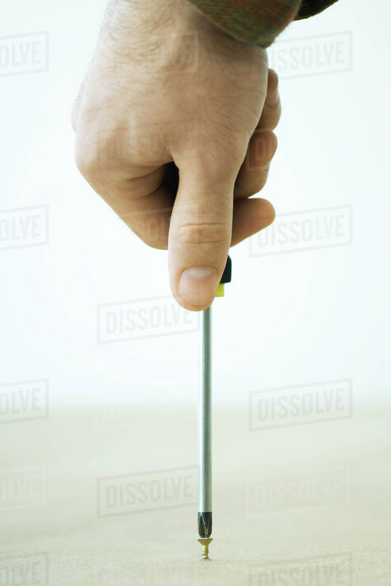 Man using screwdriver, cropped view of hand - Royalty-free Stock Photo ...