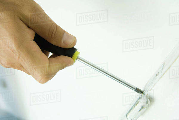 Man using screwdriver, cropped view of hand - Royalty-free Stock Photo ...