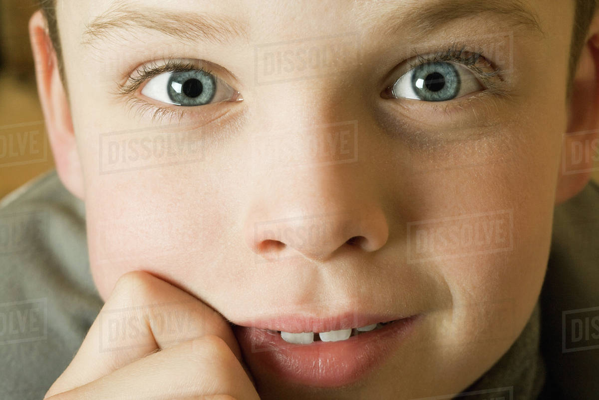 Boy's face, looking at camera, close-up - Royalty-free Stock Photo ...