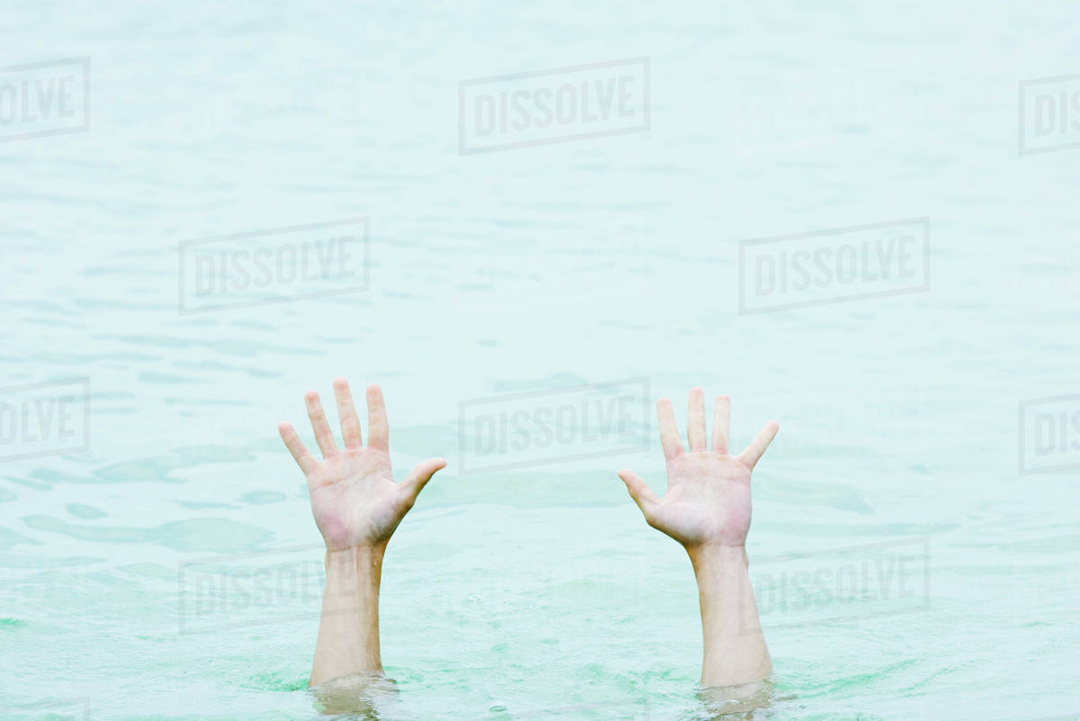 Hands rising out of water, cropped view - Royalty-free Stock Photo ...