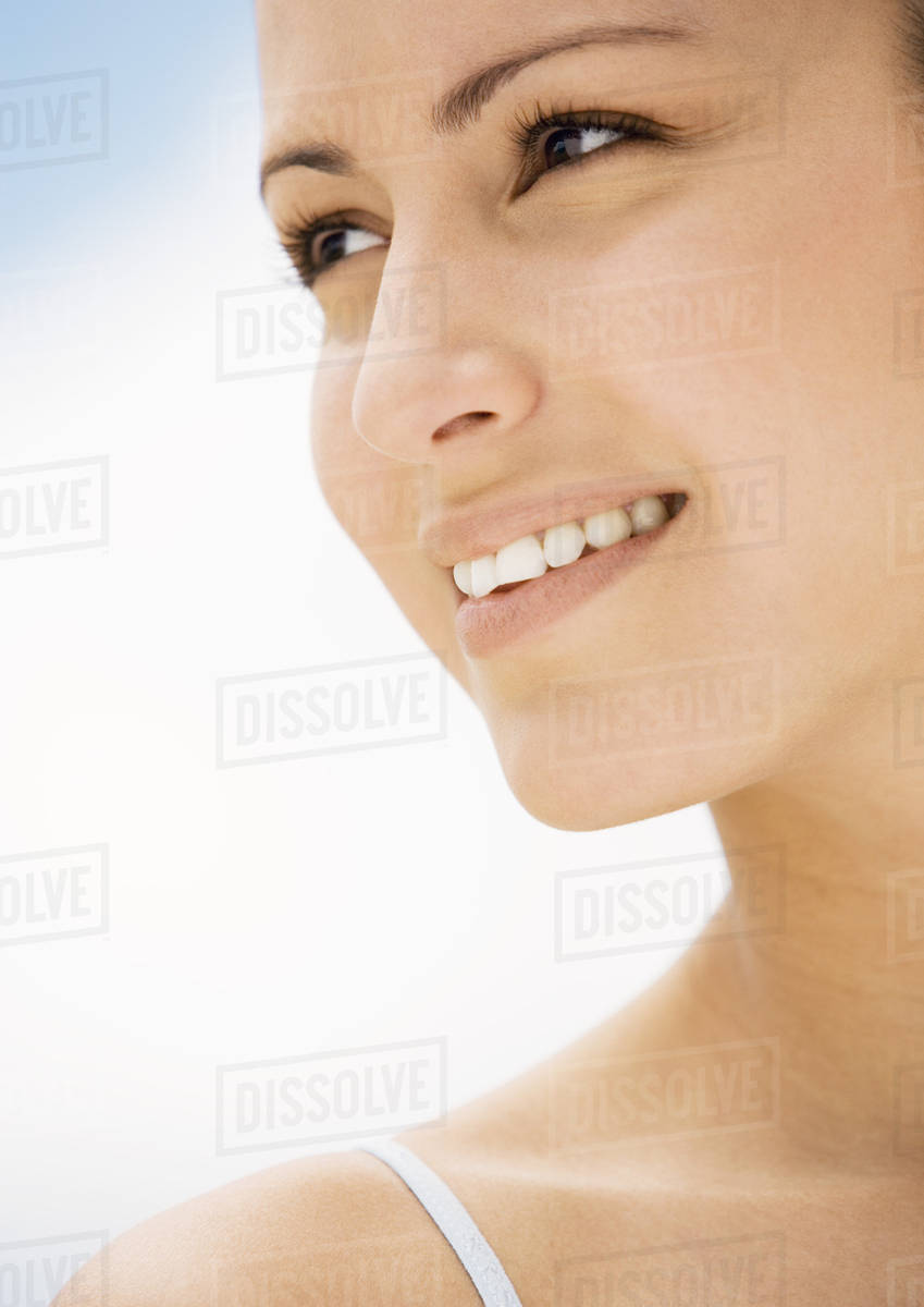 Woman's smiling face - Royalty-free Stock Photo | Dissolve