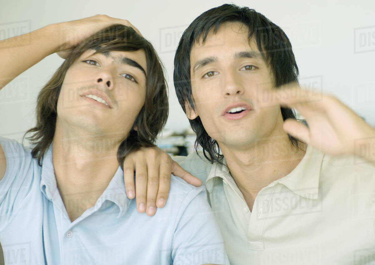 Two young men having emotional reaction - Royalty-free Stock Photo ...