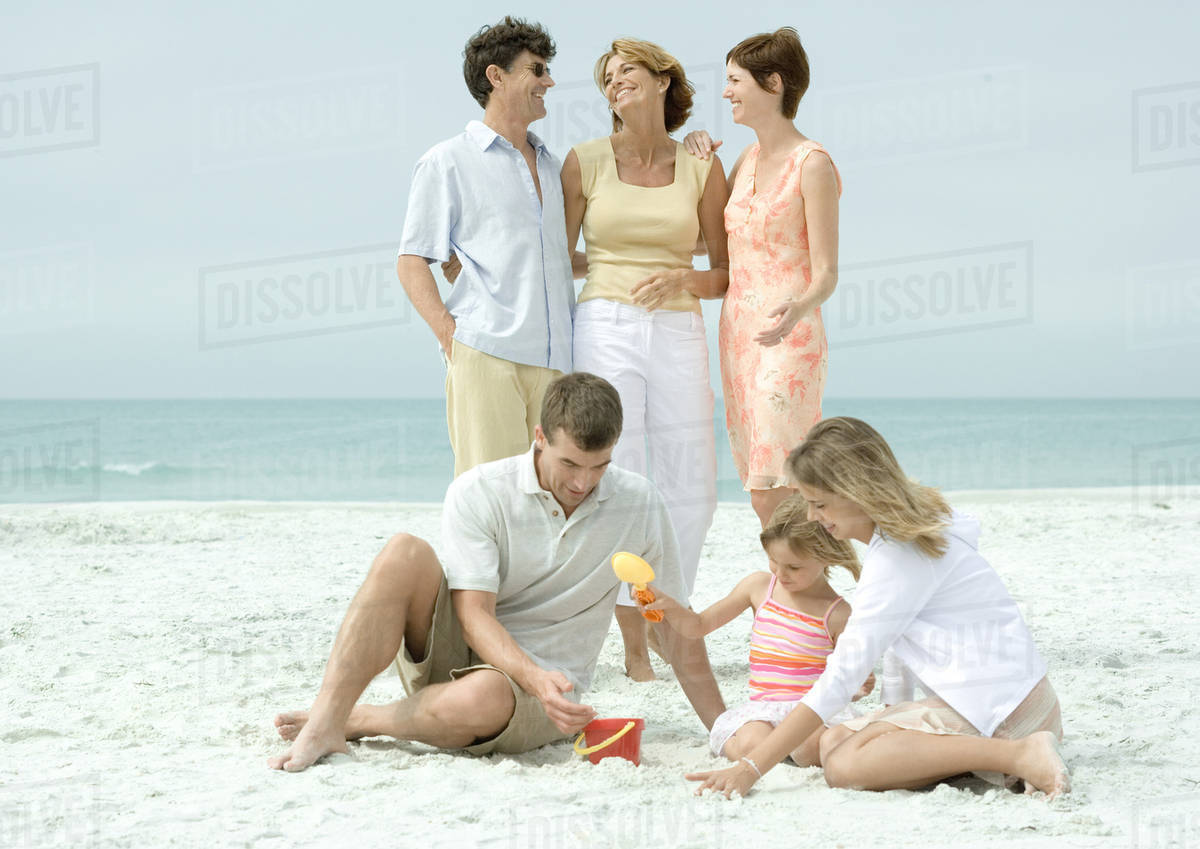 Group on beach - Stock Photo - Dissolve