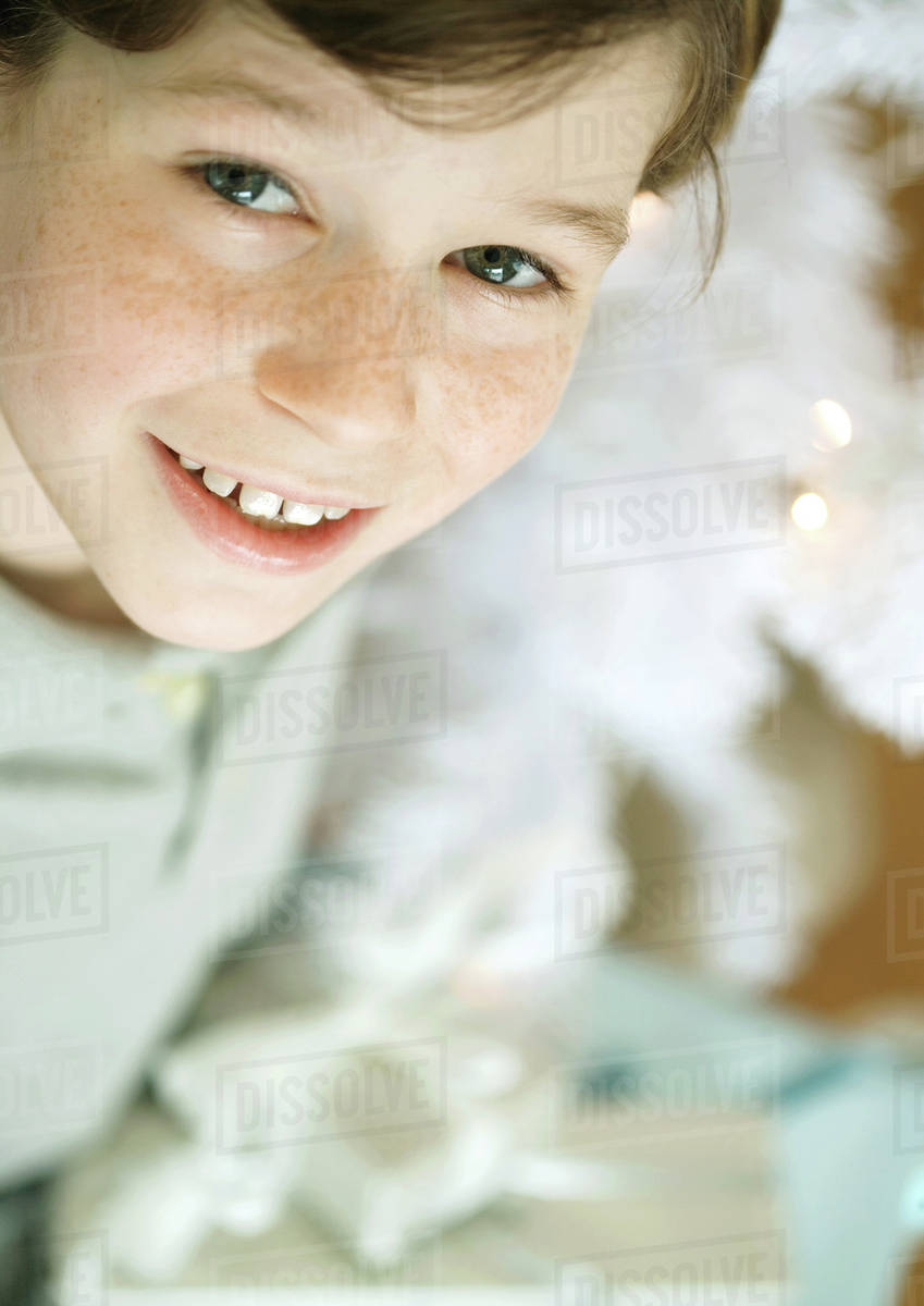 Boy smiling at camera, high angle view - Royalty-free Stock Photo ...