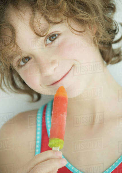 Girl with popsicle, portrait - Royalty-free Stock Photo | Dissolve
