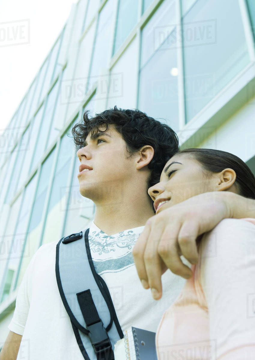 Young couple on college campus - Stock Photo - Dissolve