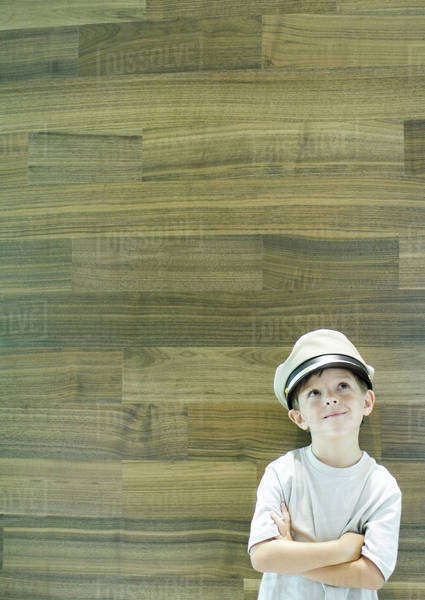 Boy wearing captain's hat - Royalty-free Stock Photo | Dissolve