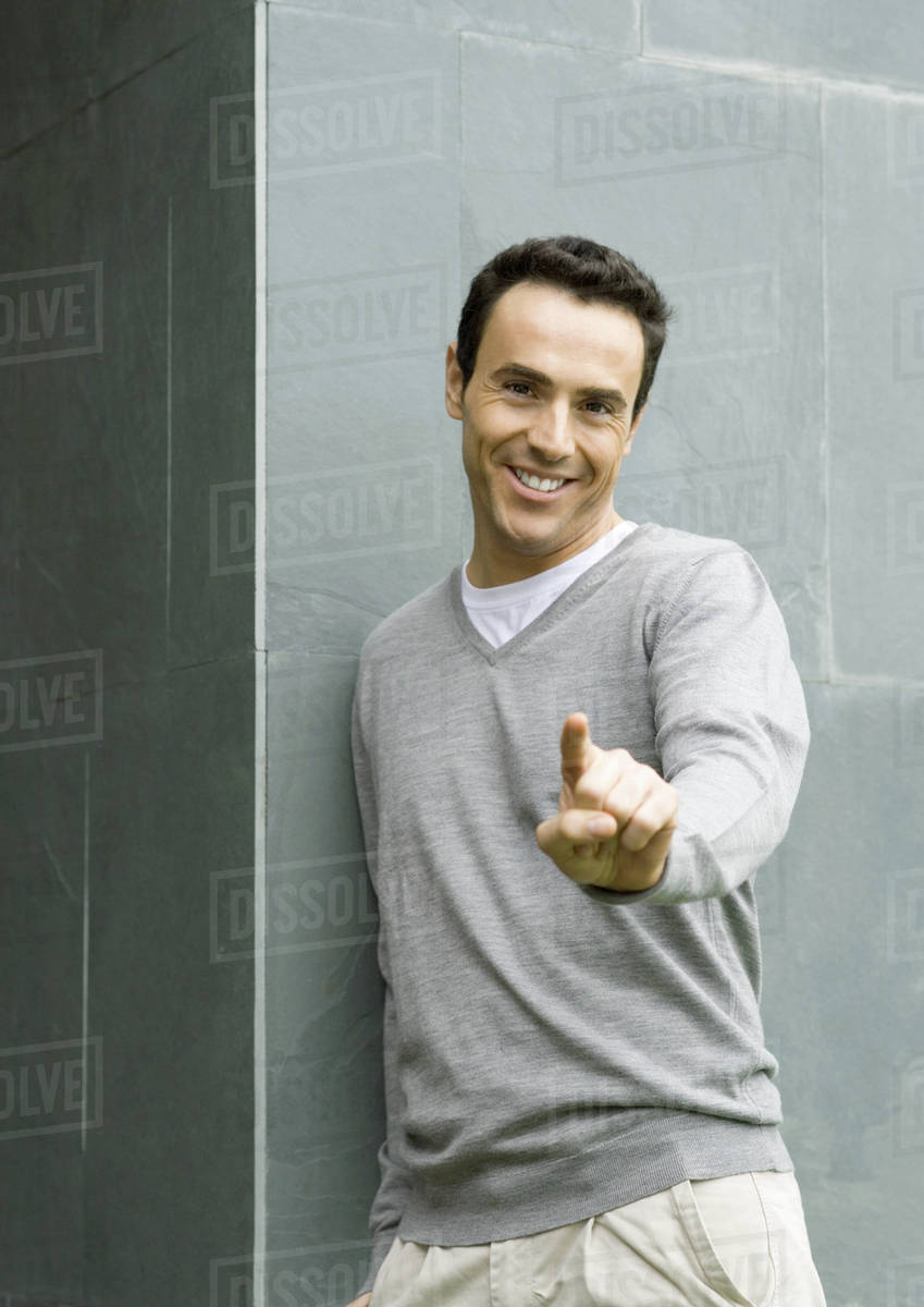 Man, pointing at camera, portrait - Royalty-free Stock Photo | Dissolve