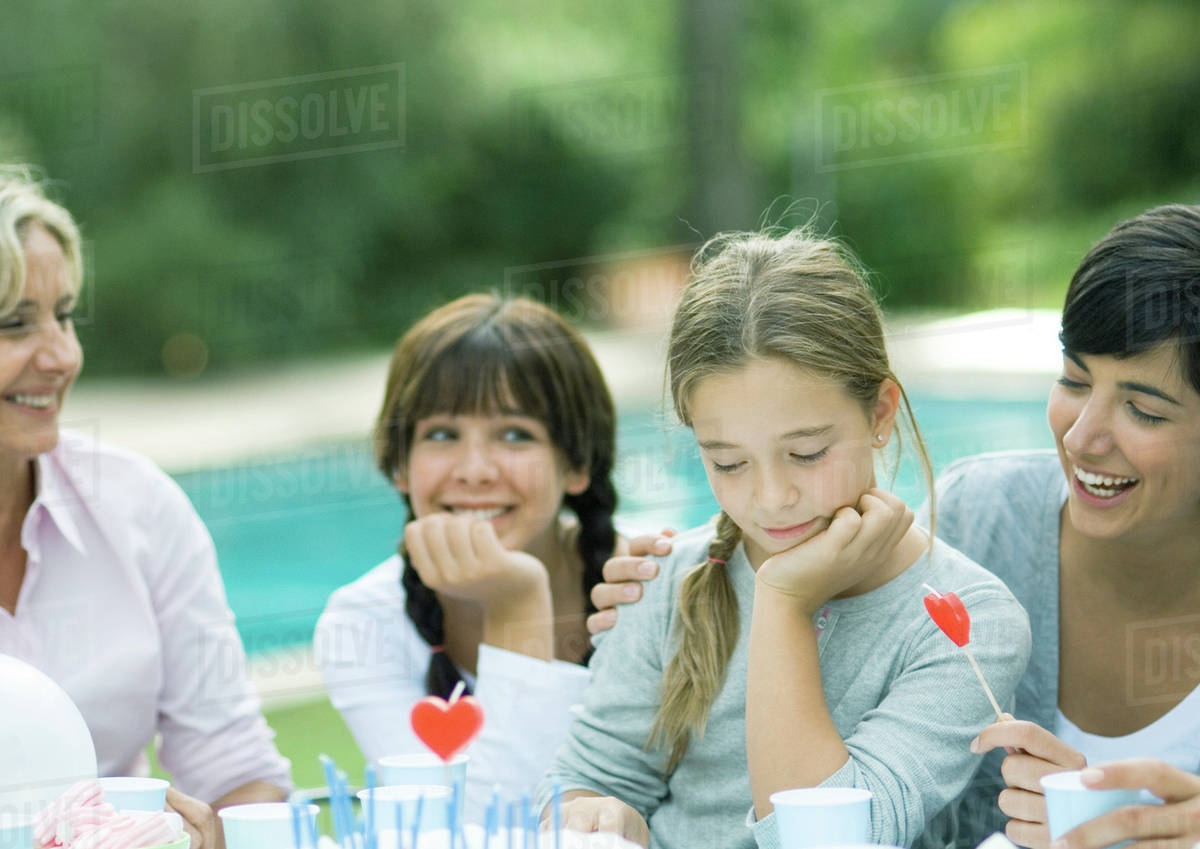 Family having outdoor birthday party - Royalty-free Stock Photo | Dissolve