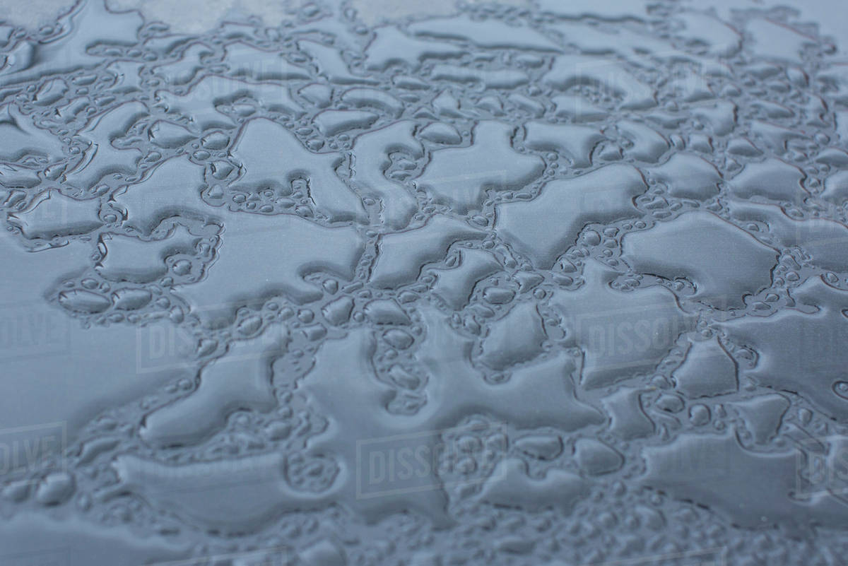 Wet metal surface - Royalty-free Stock Photo | Dissolve