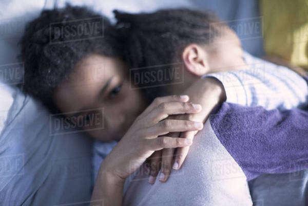 Children embracing - Royalty-free Stock Photo | Dissolve