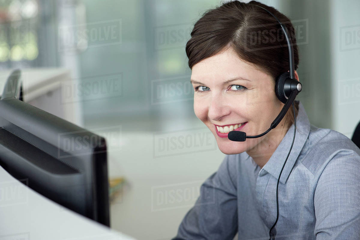 Telemarketer, portrait - Stock Photo - Dissolve