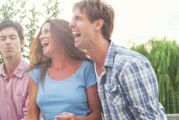 Friends hanging out, laughing and having fun together - Stock Photo ...