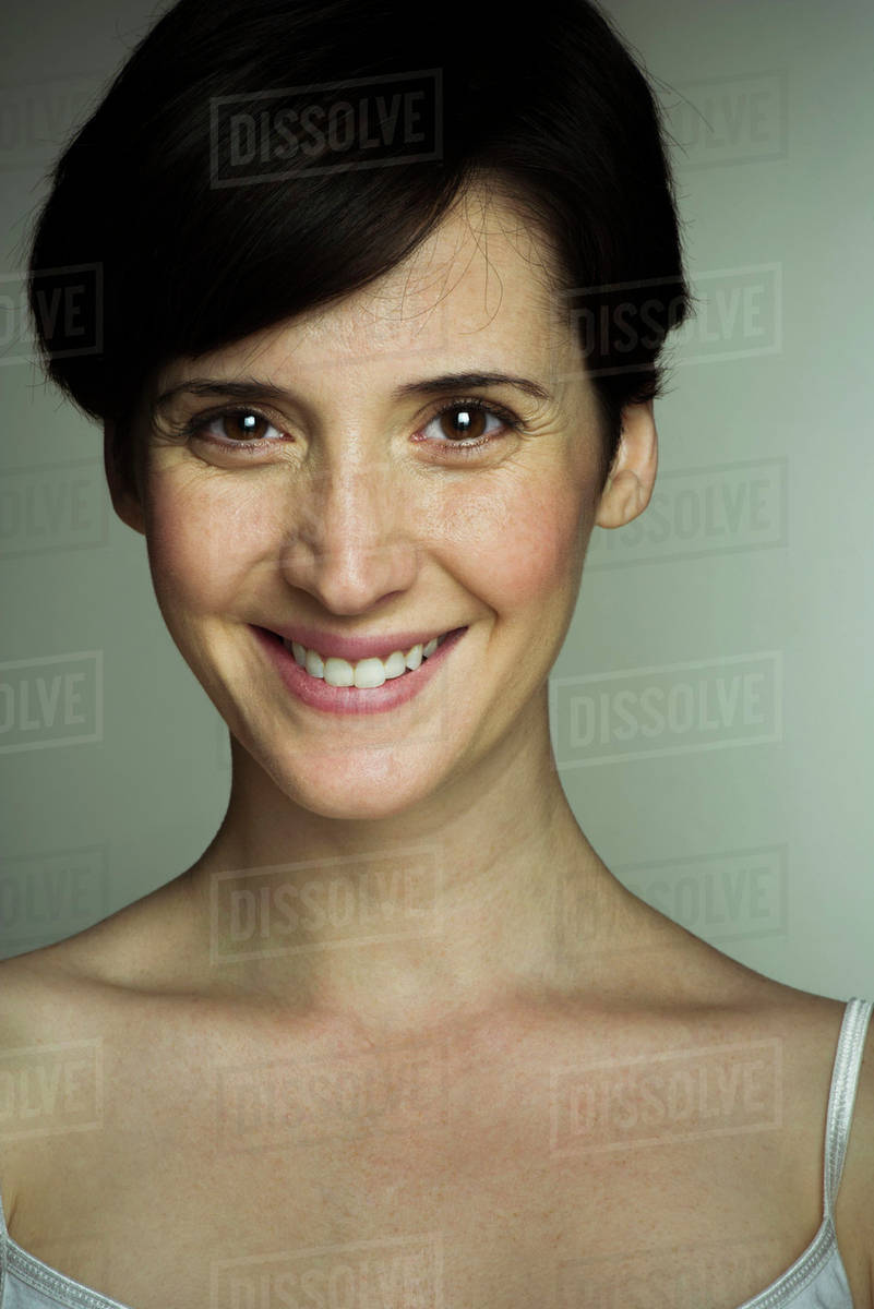 Mid-adult woman, portrait - Royalty-free Stock Photo | Dissolve