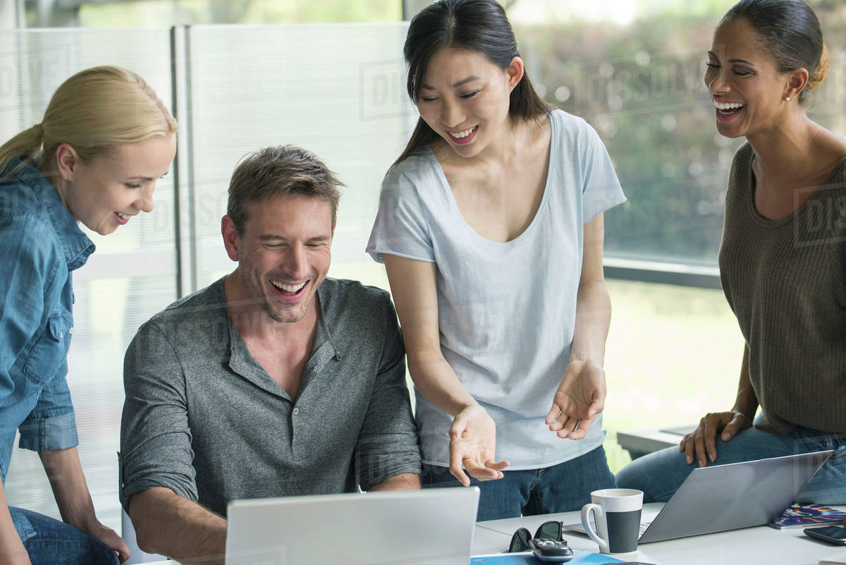 Colleagues collaborating on project - Royalty-free Stock Photo | Dissolve