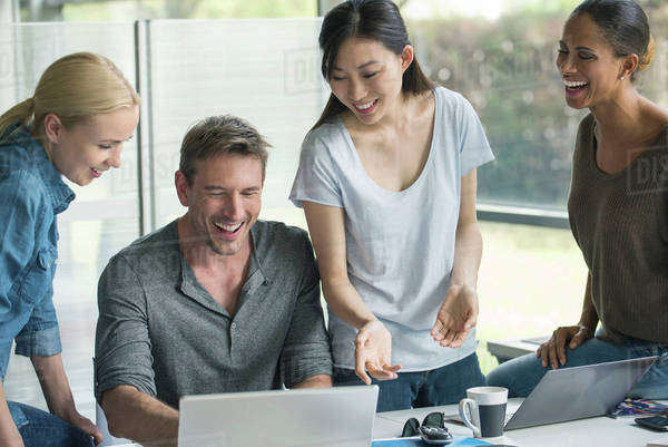 Colleagues collaborating on project - Royalty-free Stock Photo | Dissolve