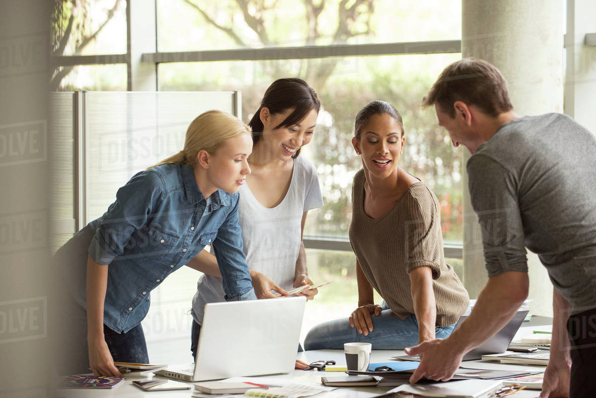 Business associates working together - Royalty-free Stock Photo | Dissolve