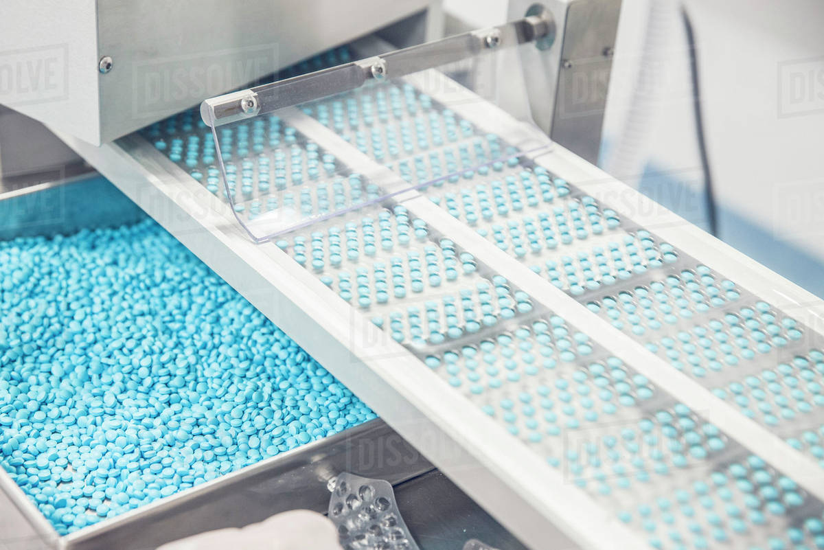Pill packaging machinery - Stock Photo - Dissolve