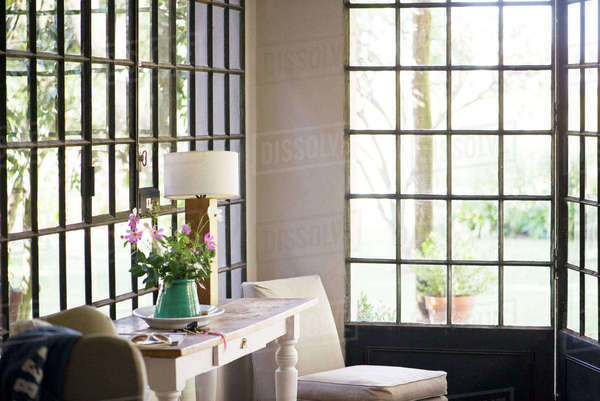 Home interior, living room with natural lighting from multiple windows ...