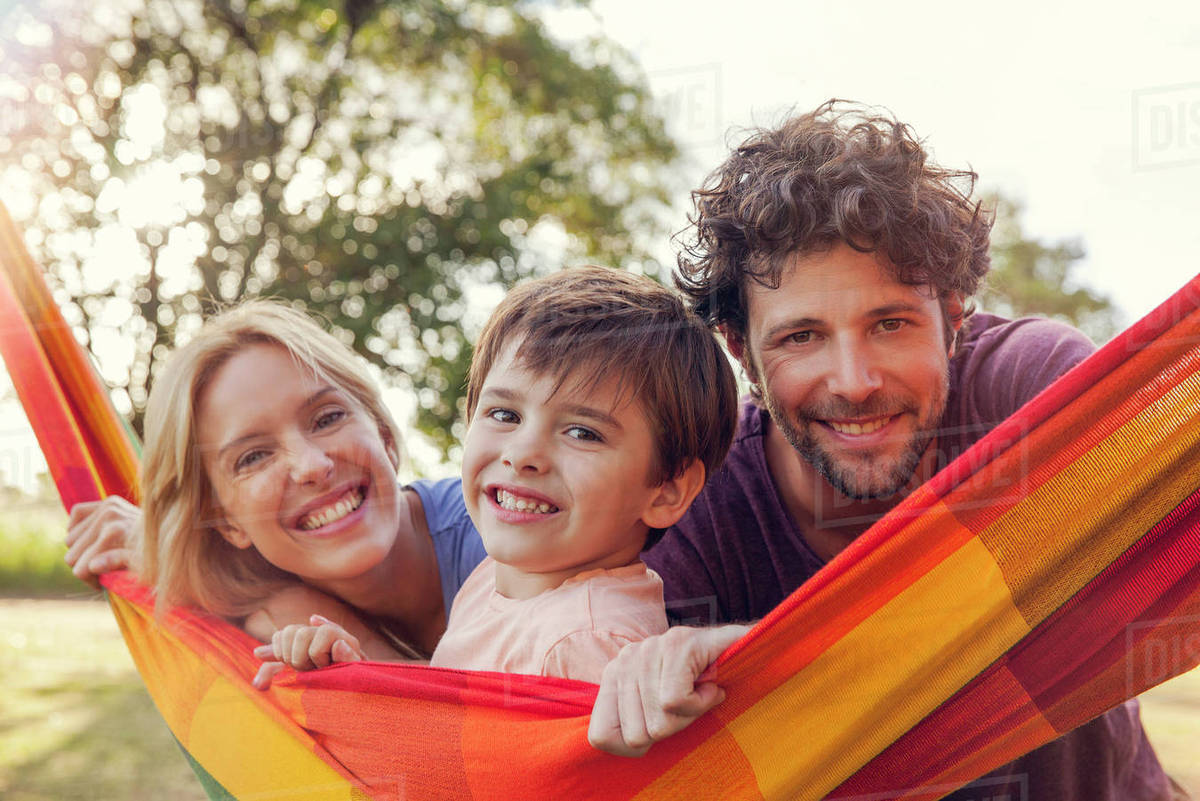Family relaxing together outdoors, portrait - Royalty-free Stock Photo ...