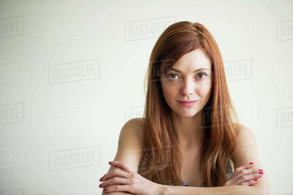 Woman with arms folded - Royalty-free Stock Photo | Dissolve