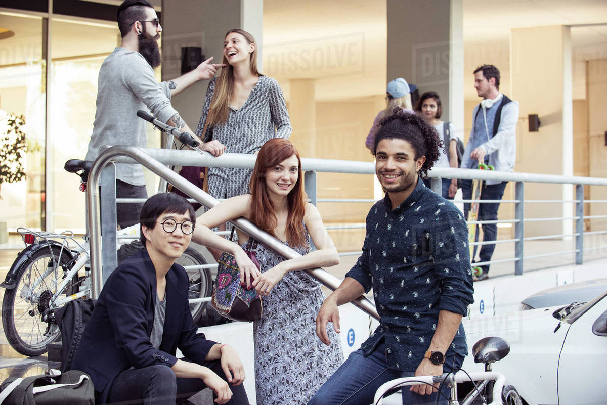 College students hanging out together outdoors - Royalty-free Stock ...