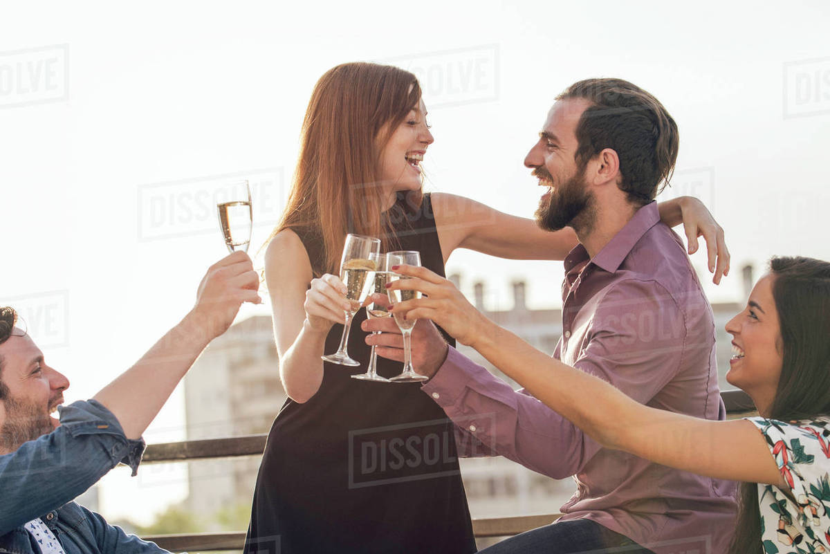 Friends drinking champagne together outdoors - Royalty-free Stock Photo ...