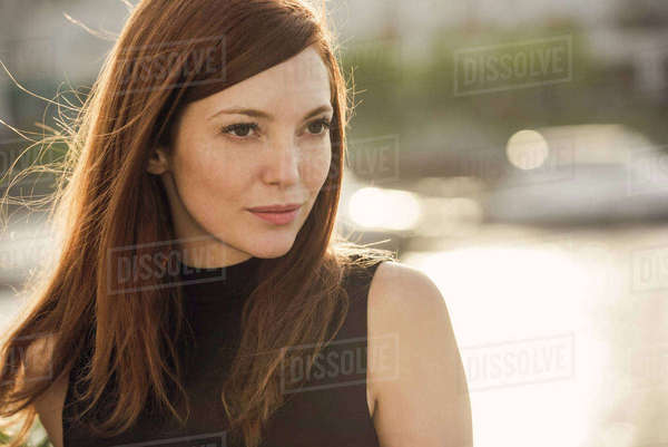 Mid adult woman, portrait - Stock Photo - Dissolve