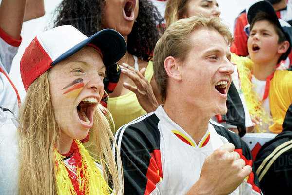German football fans watching football match - Royalty-free Stock Photo ...