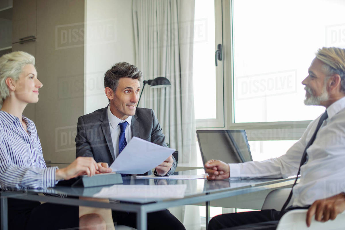 Businessman meeting with clients - Royalty-free Stock Photo | Dissolve