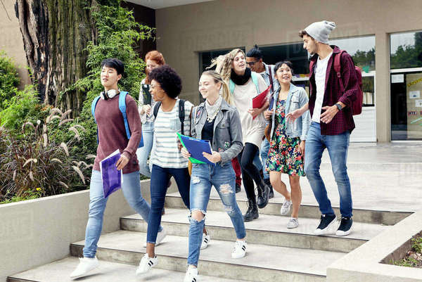 College students walking on campus - Royalty-free Stock Photo | Dissolve