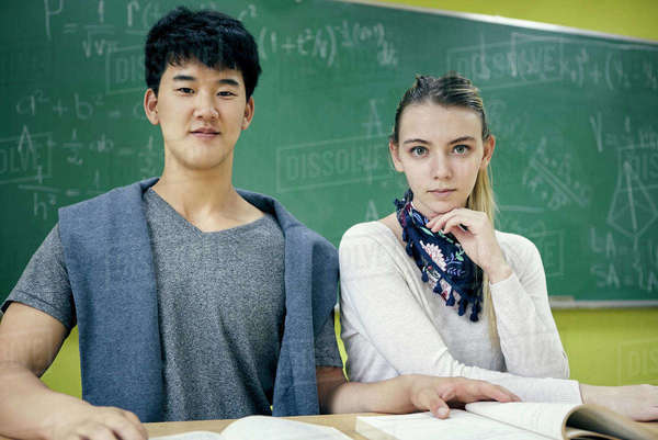 Students sitting in math class, portrait - Royalty-free Stock Photo ...