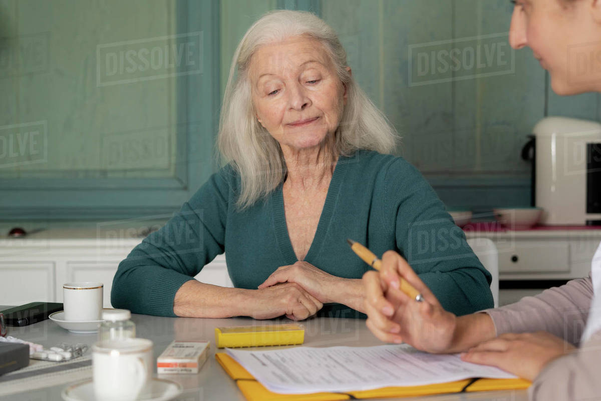 Doctor taking medical history of patient - Royalty-free Stock Photo ...