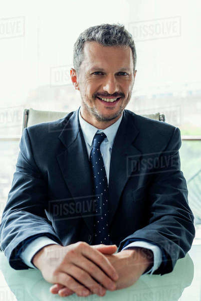 Portrait of businessman in office - Royalty-free Stock Photo | Dissolve